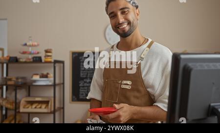 Arab man with beard working at small business ecommerce holding bitcoin ...