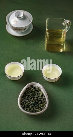 An Elegant Tea Setup Featuring Green Tea and Various Accessories for an ...