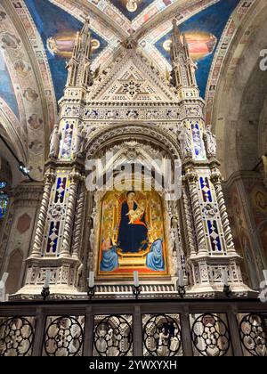 The elaborate carved marble tabernacle in the Orsanmichele Church in ...