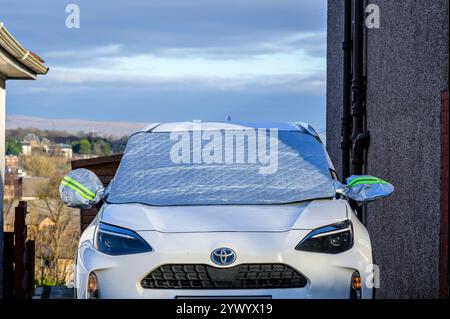 Ice covers the windscreen of a car in Montreal, Monday, Dec. 29, 2025 ...