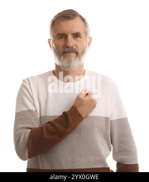 Mature man making promise on white background. Oath gesture Stock Photo ...