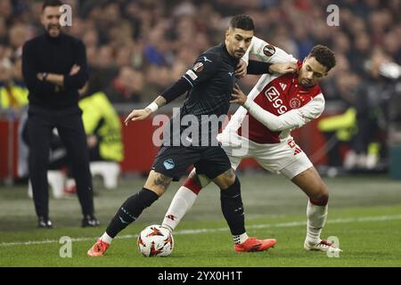Mattia Zaccagni of SS Lazio,Devyne Rensch of AS Roma during the serie A ...
