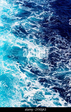Areal shot of deep blue and rough sea with lot of sea spray.Blue ...