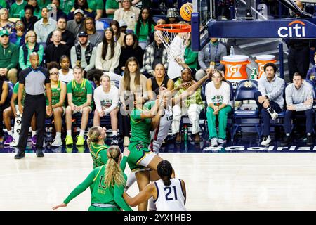 UConn center Jana El Alfy (8) shoots around Butler guard Riley Makalusky (2) in the second half ...