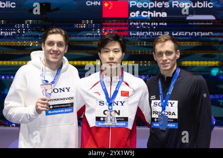 Gold medalist Neutral Athlete Russia, Kliment Kolesnikov, center ...