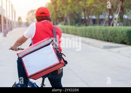 Food delivery service, rider delivering food to clints with bicycle ...