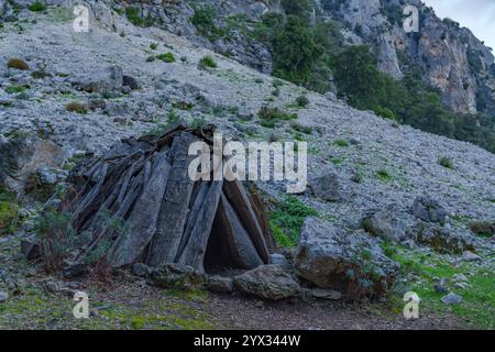 A view of an old shepherd's hut made of stones and wood, hidden in the ...