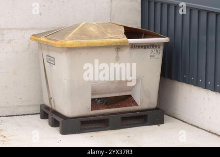 pavement gritting in the winter, seasonal road maintenance work ...