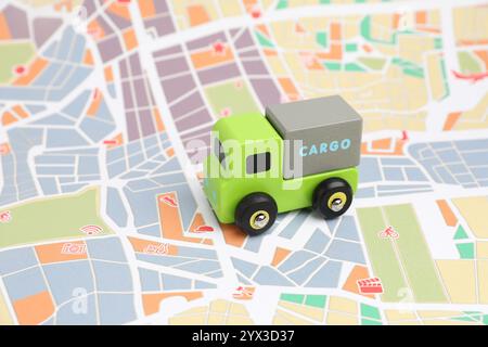 Toy truck on city map, closeup. Logistics concept Stock Photo - Alamy