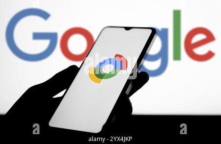 Google find my device logo is displayed on smartphone and background ...