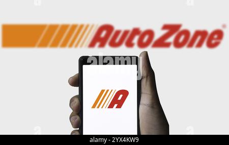 AutoZone logo on man handset Stock Photo - Alamy