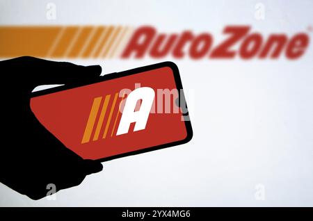AutoZone logo on man handset Stock Photo - Alamy