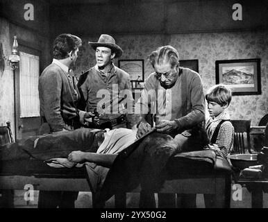 Dee Pollock, Richard Rust, Michael Landon, on-set of the western film ...