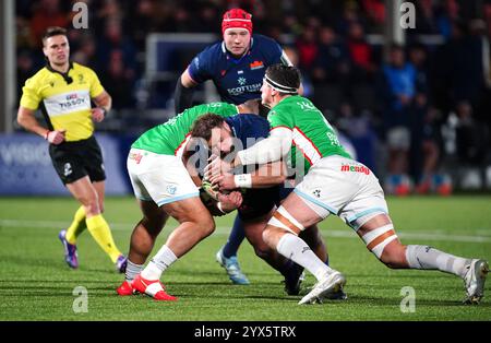 Edinburgh Rugby's Pierre Schoeman (centre) is tackled during the EPCR ...