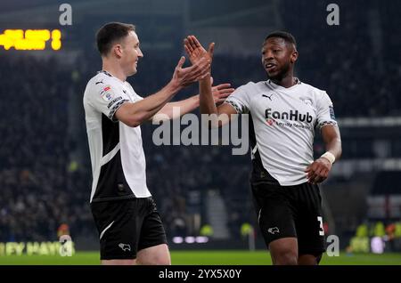 Derby County's Ebou Adams (right) celebrates after scoring his sides ...