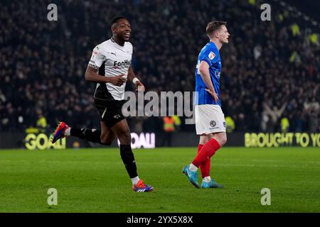 Derby County's Ebou Adams (left) and Cardiff City's Alex Robertson ...