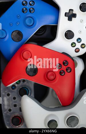 Gaming console and wireless controllers. Video game concept Stock Photo ...