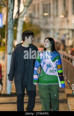 Happy family walking at the riverside on a beautiful summer day Stock ...