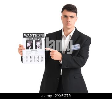 Male FBI agent with wanted poster on white background Stock Photo - Alamy