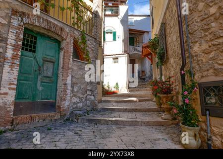 An alley among the stone houses of Maranola, a small medieval town in ...