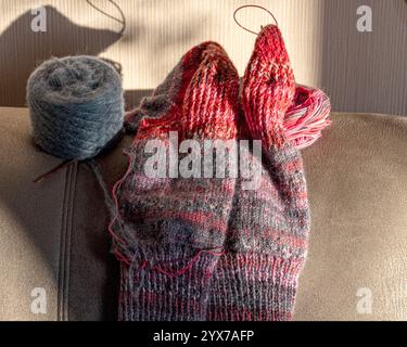 colorful knitted work in progress, handicraft concept, knit texture ...