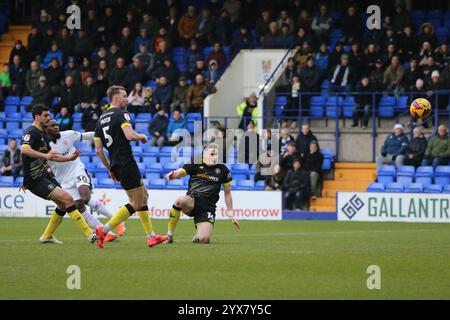 Omari Patrick of Tranmere Rovers FC under pressure from Morecambe FC's ...