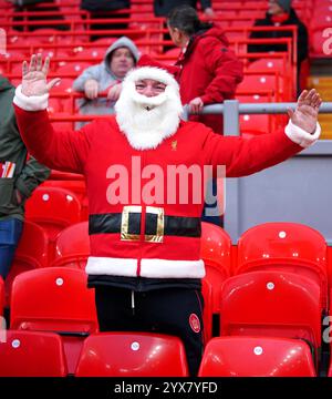 A Liverpool fan dressed as Santa Claus in stands during the Premier ...
