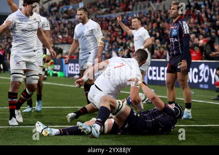 Ulster Rugby's Nick Timoney (centre) celebrates after scoring a try ...