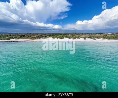 Aerial view of Maria Pia beach shoreline on a sunny day. Sardinia ...