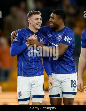 Ipswich Town's Ben Johnson (left) and Aston Villa's Jacob Ramsey battle ...