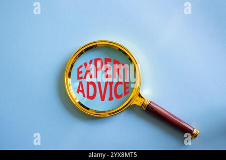 Expert advice symbol. Concept word Expert advice on magnifying glass ...