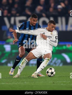 Kylian Mbappe of Real Madrid holds a trophy during the ceremony after ...