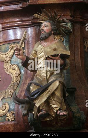 Saint Luke, a statue on the pulpit in the parish church of Saint ...