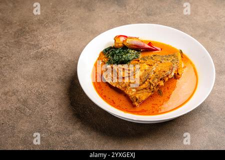 snapper curry fish head from padang, west sumatera, indonesia Stock ...