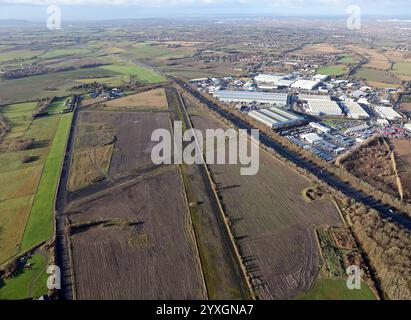 aerial view across the M56 motorway towards Appleton Thorn Trading ...