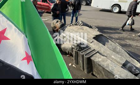 The demolished statue of Hafez al-Assad in the streets of Damascus ...