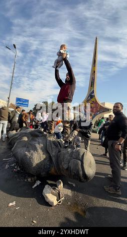 The demolished statue of Hafez al-Assad in the streets of Damascus ...