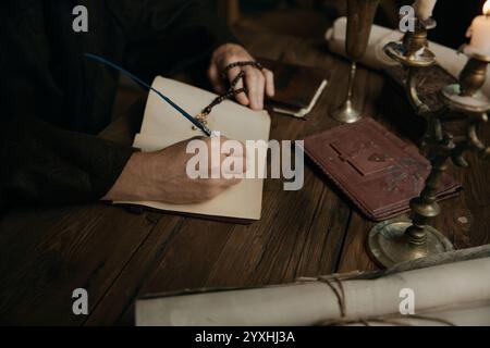 Medieval monk chronicler writing ancient manuscript under candlelight ...