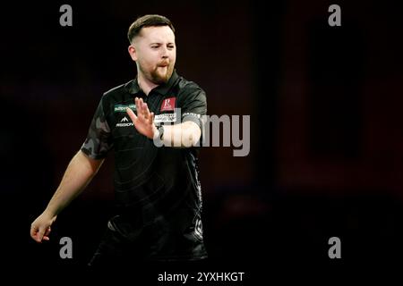 Connor Scutt reacts during his match against Simon Whitlock on day five ...