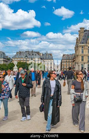 Hundreds of tourists at the Louvre in Paris, France, the new modern day ...
