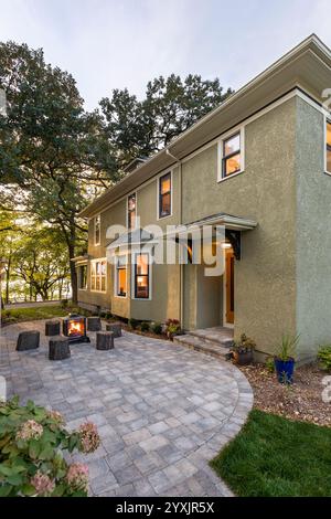 Back exterior of remodeled house showing addition and deck Stock Photo ...