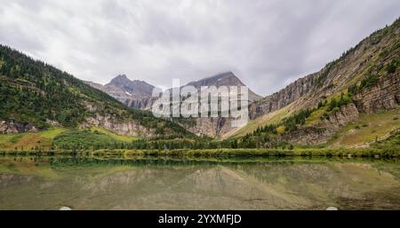 Atsina Lake, looking towards Cathedral Peak and Stoney Indian Pass ...