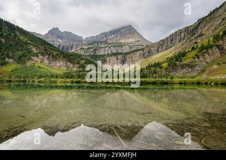 Atsina Lake, looking towards Cathedral Peak and Stoney Indian Pass ...