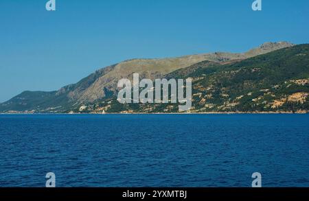 The Ionian coastline near Kalami, Corfu. Here, the green hills of the ...