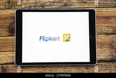Flipkart application on smartphone with laptop background Stock Photo ...