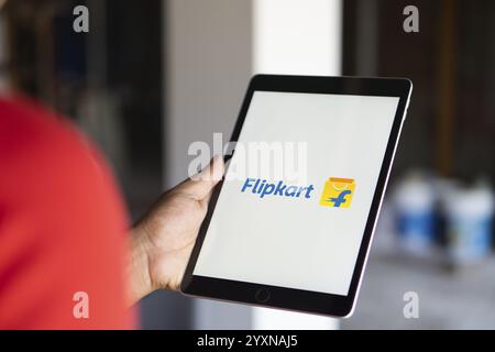Flipkart application on smartphone with laptop background Stock Photo ...