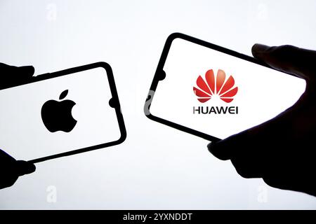 Huawei vs Apple logo on a smartphone Stock Photo - Alamy