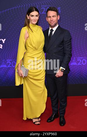 Mark Cavendish with his wife Peta arriving at Windsor Castle, Berkshire ...