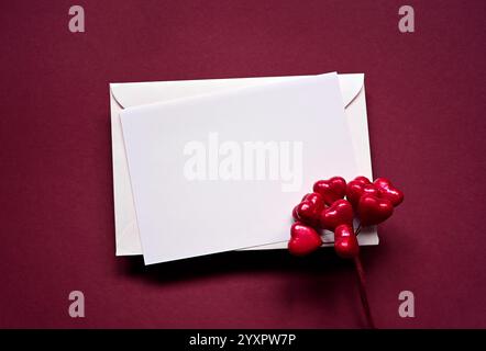 Red paper heart on top of wooden cross crucifix. Isolated on white ...