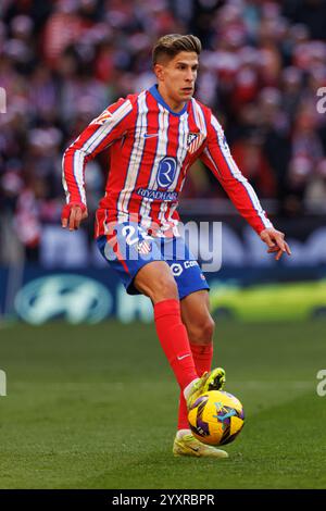 Alvaro Rodriguez of Getafe CF and Giuliano Simeone of Atletico de ...